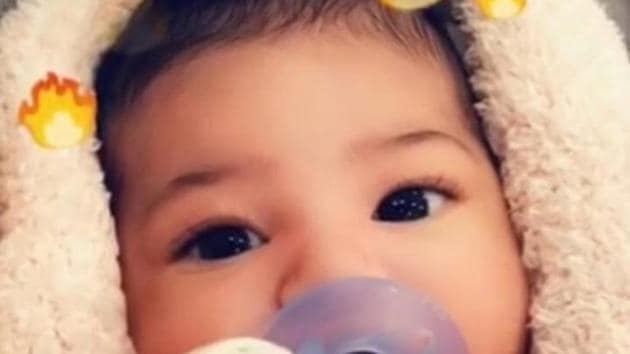 Travis Scott and Kylie Jenner share first photos of daughter Stormie ...