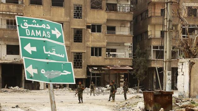 Photos: Thousands of Syrians leave rebel held Ghouta in largest ...