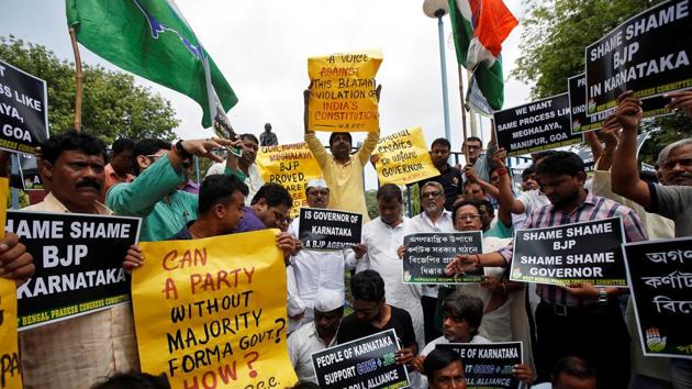 Congress workers protest outside Karnataka Governor’s Rajkot residence ...