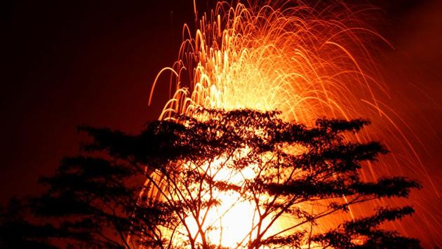 Photos: Hawaii’s Kilauea volcano lava reaches Pacific Ocean | Hindustan ...