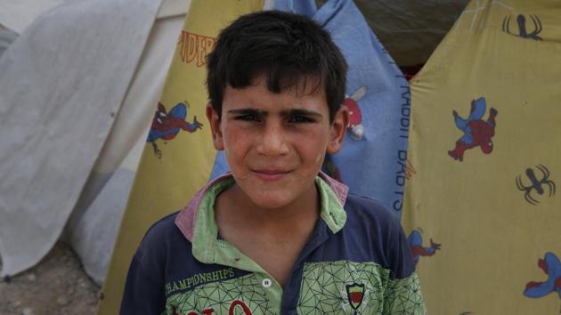 Photos: A Syrian family finds peace, if only in exile at a refugee camp ...