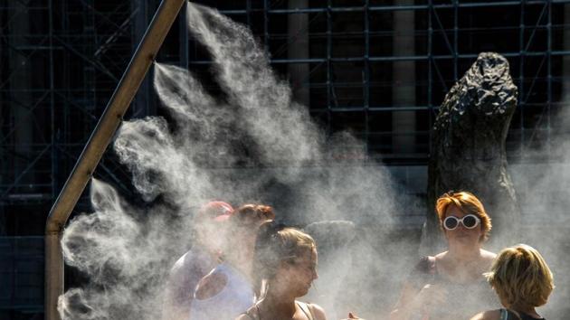 Photos: Europe swelters as temperatures reach continental all-time high ...