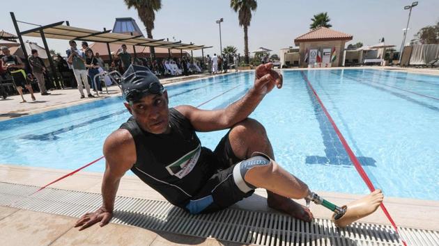 Lost limbs in ISIS attacks, Iraqi amputees take special swimming race ...
