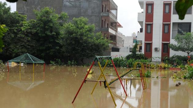 Flooded, potholed sector roads in Gurugram compound troubles ...