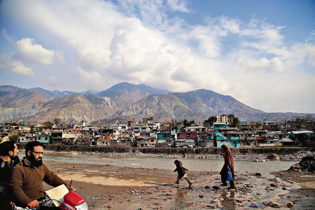 Review: Between the Great Divide: A Journey into Pakistan-Administered ...