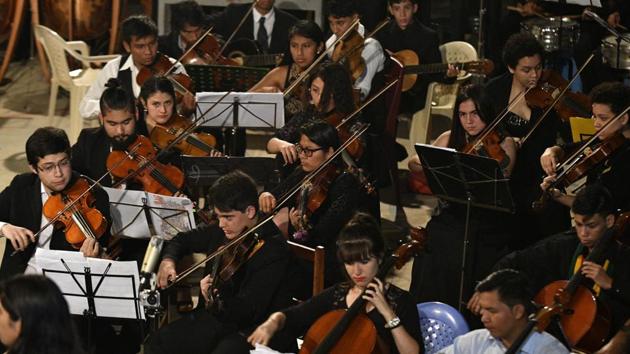 Photos: Bolivian orchestra helps provincial youth play for the future ...