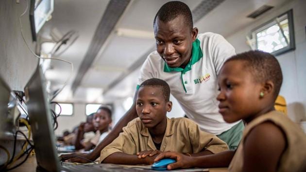 Photos: Travelling classroom bridges digital divide in Benin ...