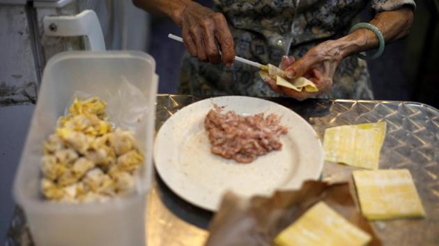 Photos: Singapore’s hawker culture faces extinction as vendors age ...