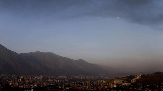 Photos: As the sun sets, Venezuela’s capital empties out | Hindustan Times