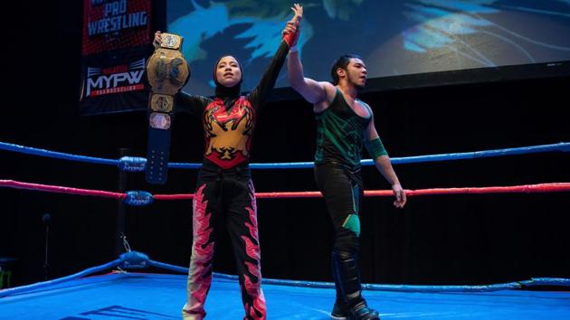 Photos: A hijab-wearing wrestler breaks barriers in Malaysia ...