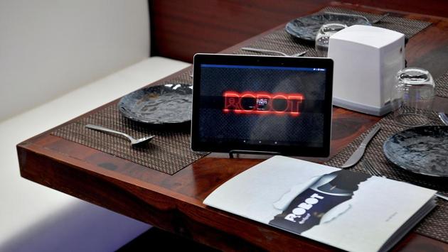 Photos: Robot waiters serving food at Bengaluru’s first Robot ...