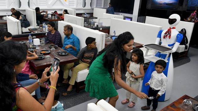 Photos: Robot waiters serving food at Bengaluru’s first Robot ...