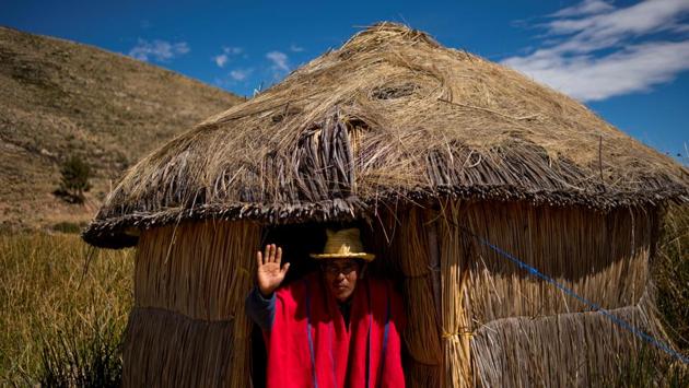 Photos: Lake Titicaca, once an Andean deity, faces pollution threat ...