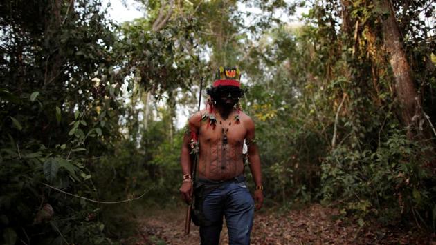 Photos: Amazon forest guardians stalk illegal loggers, fight fire with ...