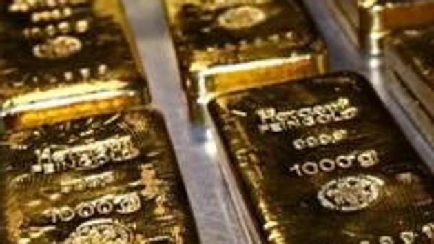 Gold slip to Rs 37,571 per 10 gram in futures trading on profit-booking ...
