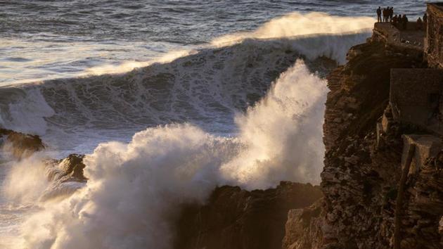 Photos: Extreme surfers flock to Portugal’s Nazare to catch record ...