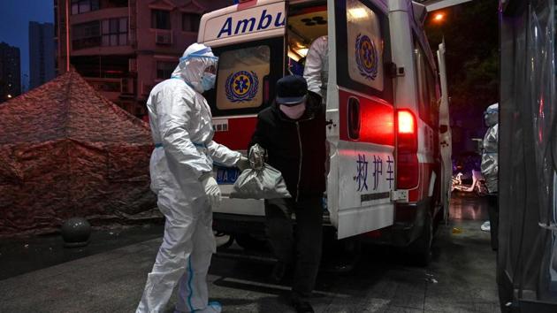 Photos: In one Wuhan hospital, long lines, fear and frustration ...
