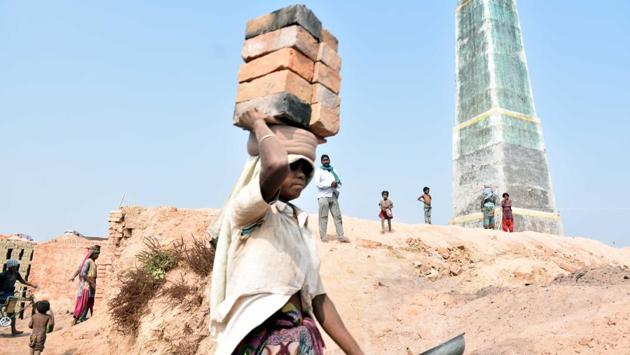 Photos: Away from home, migrant workers fire brick kilns in lockdown ...