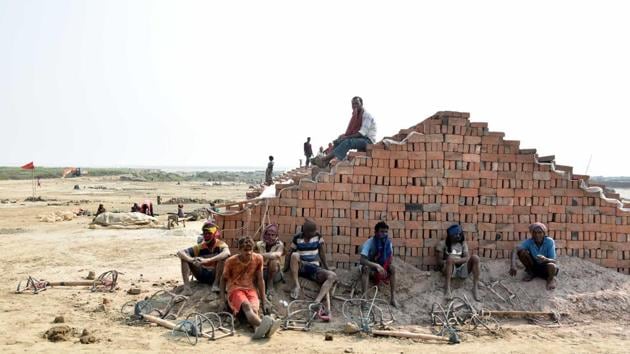 Photos: Away from home, migrant workers fire brick kilns in lockdown ...