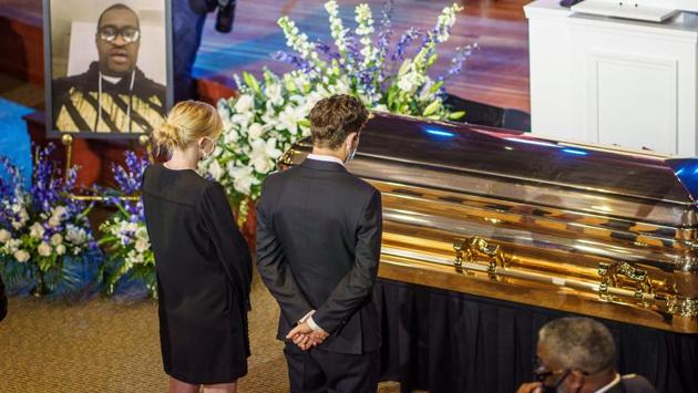 Photos: A solemn memorial for George Floyd; politicians call for change ...