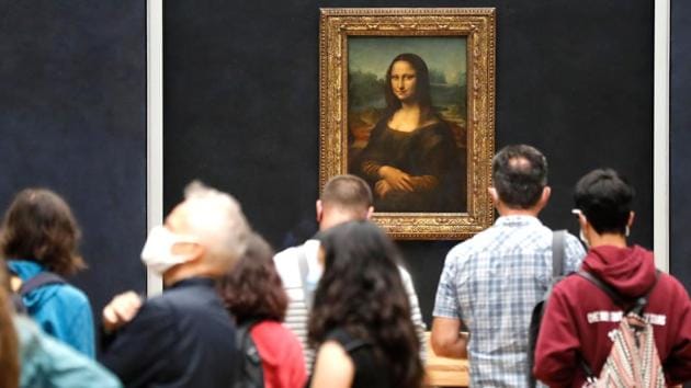 Photos: Mona Lisa is back; Louvre Museum reopens in Paris after 4 ...