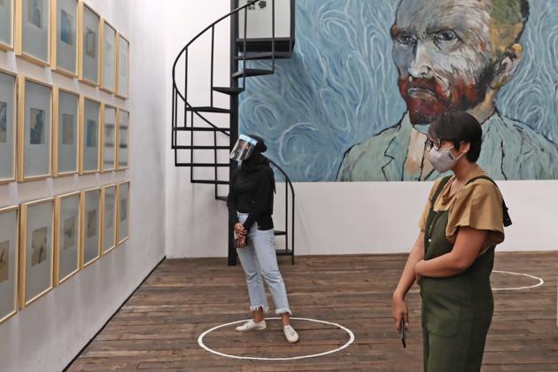Photos: Indonesia’s art lovers practise social distancing inside ...