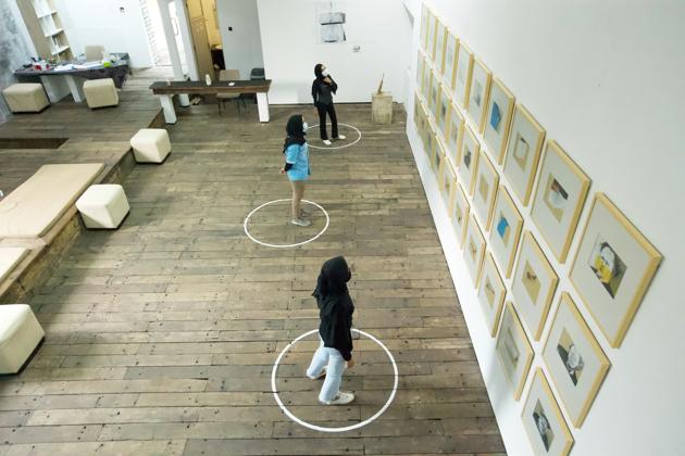 Photos: Indonesia’s art lovers practise social distancing inside ...