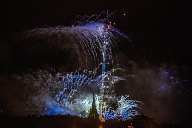 Photos: Bastille Day fireworks light up Eiffel Tower, Paris sky ...