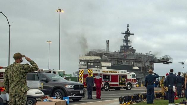 US Navy warship stable, fire could be out in 24 hours, says official ...