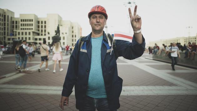 Photos: Belarusian protesters hold tokens of resistance, describe fear ...