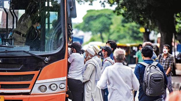 Rush at stops defeats social distancing in Delhi buses | India News