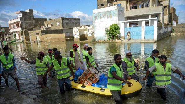Photos: Highest August rains on record leave Karachi inundated ...