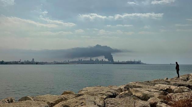 Photos of the week: Wildfires in the US and flare at the port of Beirut ...