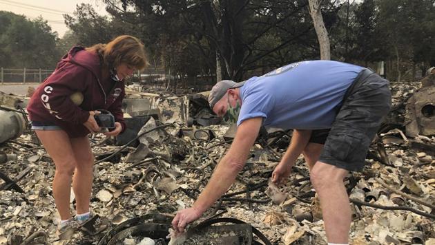 ‘The fire is outflanking us’: California wildfire evacuees return home ...