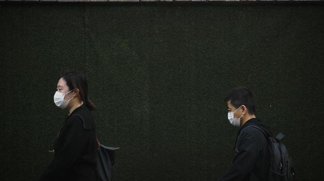 New curbs in China’s Xinjiang after spike in symptomless Covid-19 cases ...