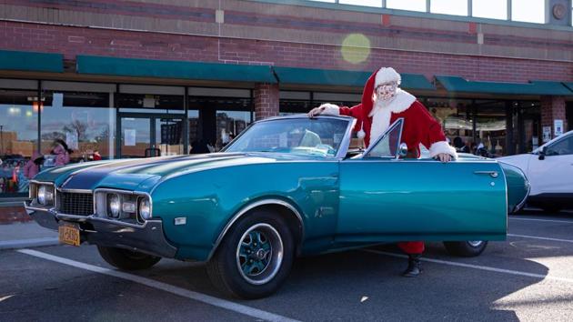 Santa drives a turquoise convertible? Lawyer skips work to deliver ...
