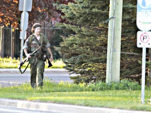 Alleged cop killer surrenders in Canada | World News