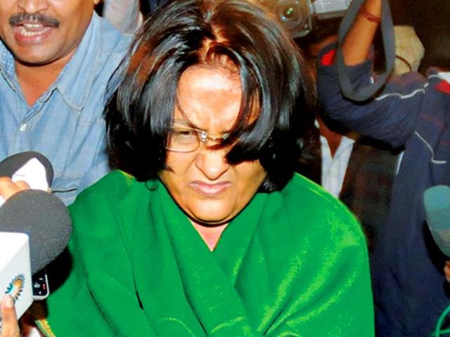 MP: Scam-tainted IAS officer appears in court on wheelchair to ...