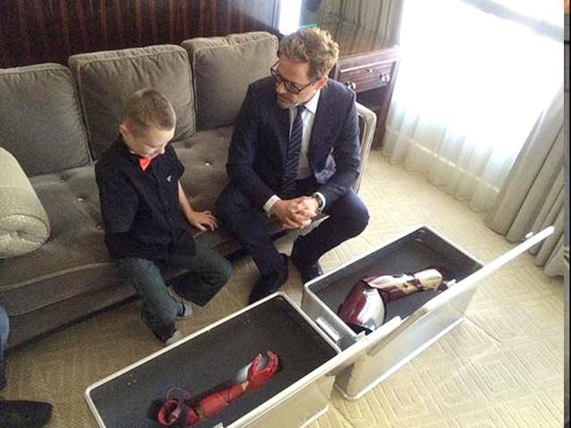 A real superhero: Robert Downey Jr gifts Iron Man arm to boy ...