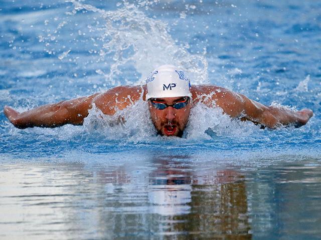 Phelps back from suspension, marks return with 100m win | Hindustan Times