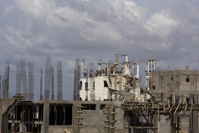 Rebuilding destroyed home, Gaza family first to return after war ...