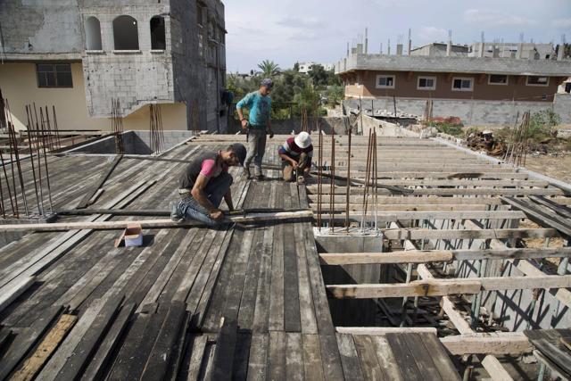 Rebuilding destroyed home, Gaza family first to return after war ...
