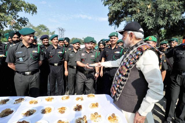 In pics: Modi makes surprise visit, spends Diwali with soldiers ...
