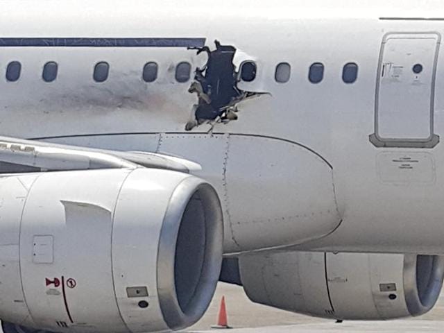 Somali plane forced to land after explosion rips hole in fuselage ...