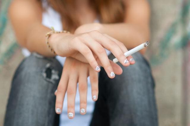 Girls! In case you had no clue, every cigarette is rotting your insides ...