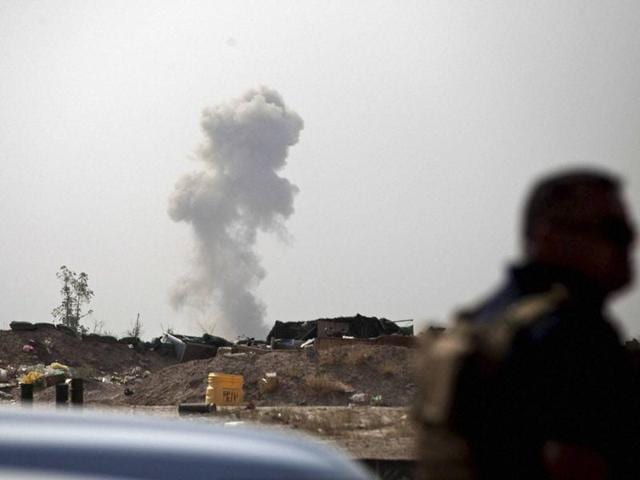 Iraqi forces find mass grave near Islamic State-held Fallujah | World News