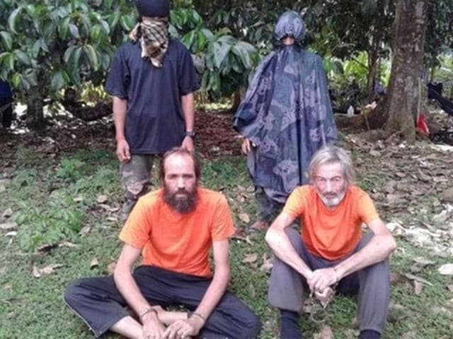 Abu Sayyaf militants rejoiced as Canadians were beheaded: Hostage ...