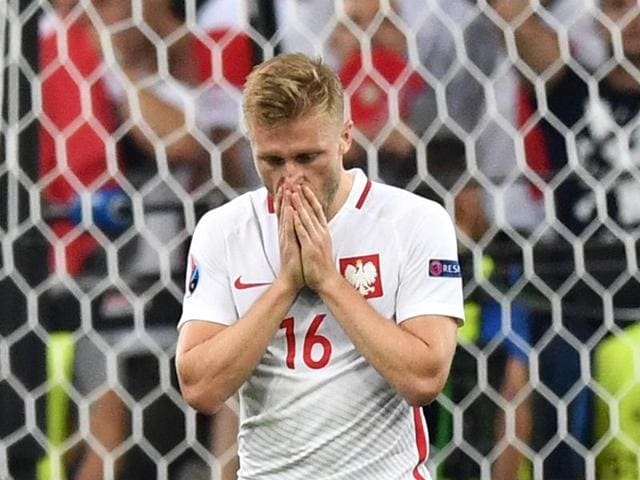 Lost as a team: Poles rally round ‘Kuba’ after penalty miss vs Portugal ...