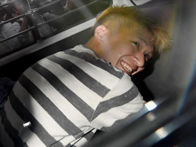 Japan knife attacker grins at cameras, wished that disabled people ...