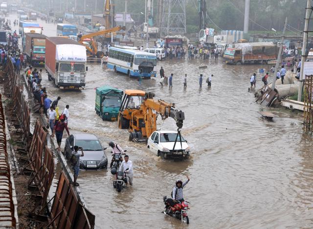 In pics: Year after year it rains trouble at Gurgaon’s traffic hotspot ...